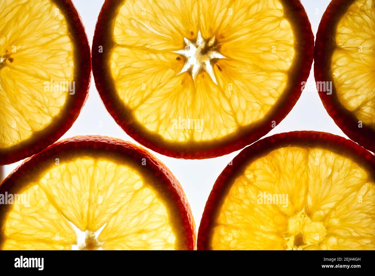 Orange fruit half sliced isolated on white background Stock Photo - Alamy