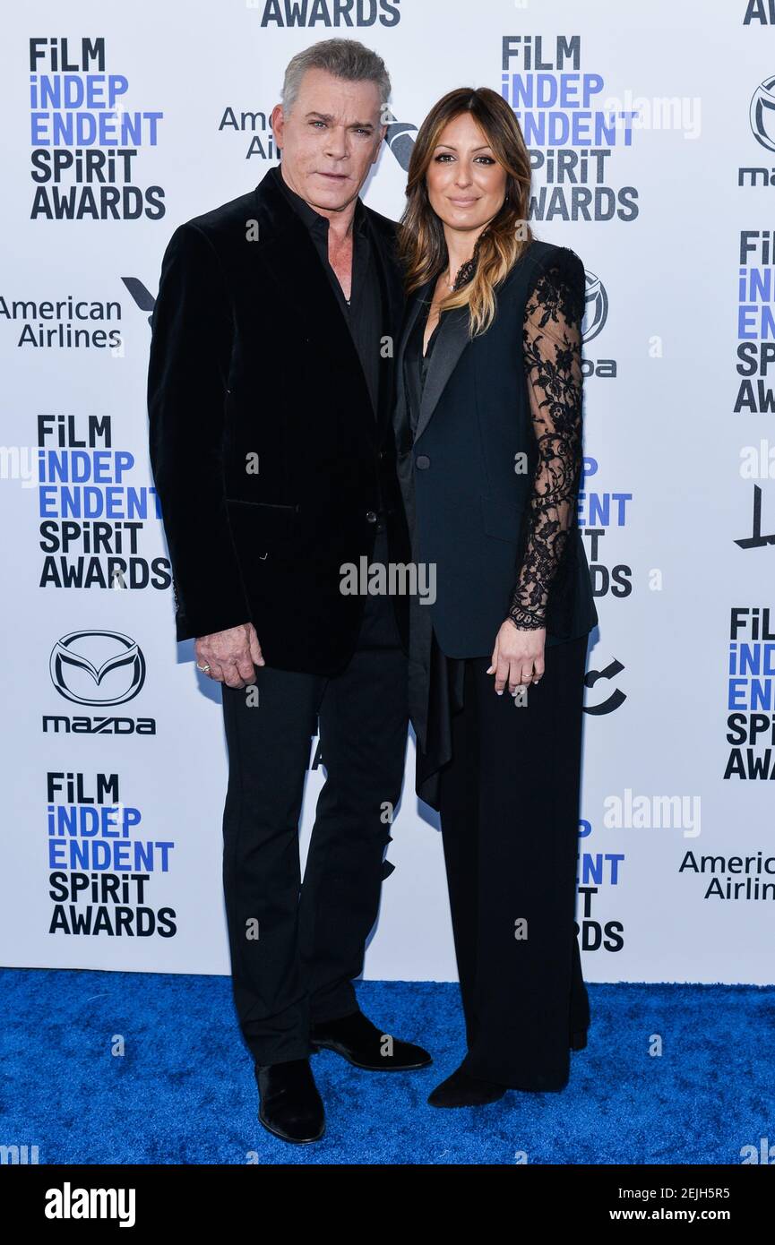 Ray Liotta and Jacy Nittolo walking on the red carpet at the 35th ...
