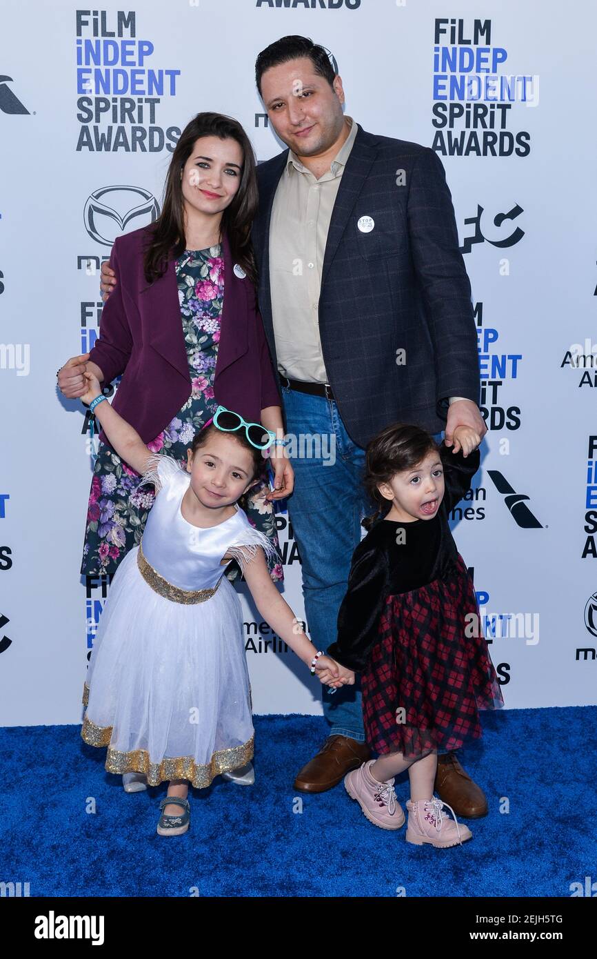 Hamza al-Kateab, and Waad Al-Kateab walking on the red carpet at the ...