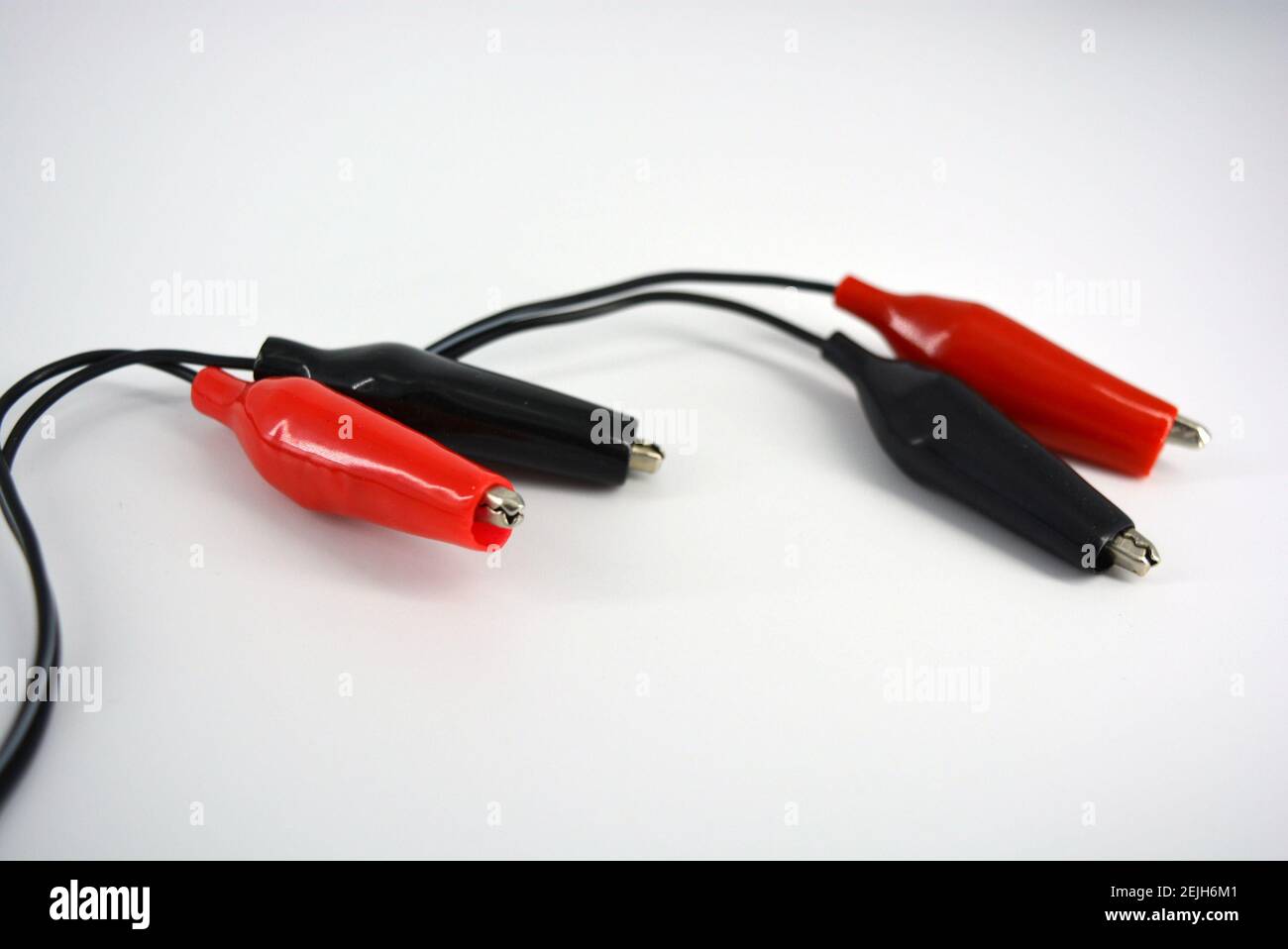 Black wire with red and black insulation, rubber and metal crocodiles ...