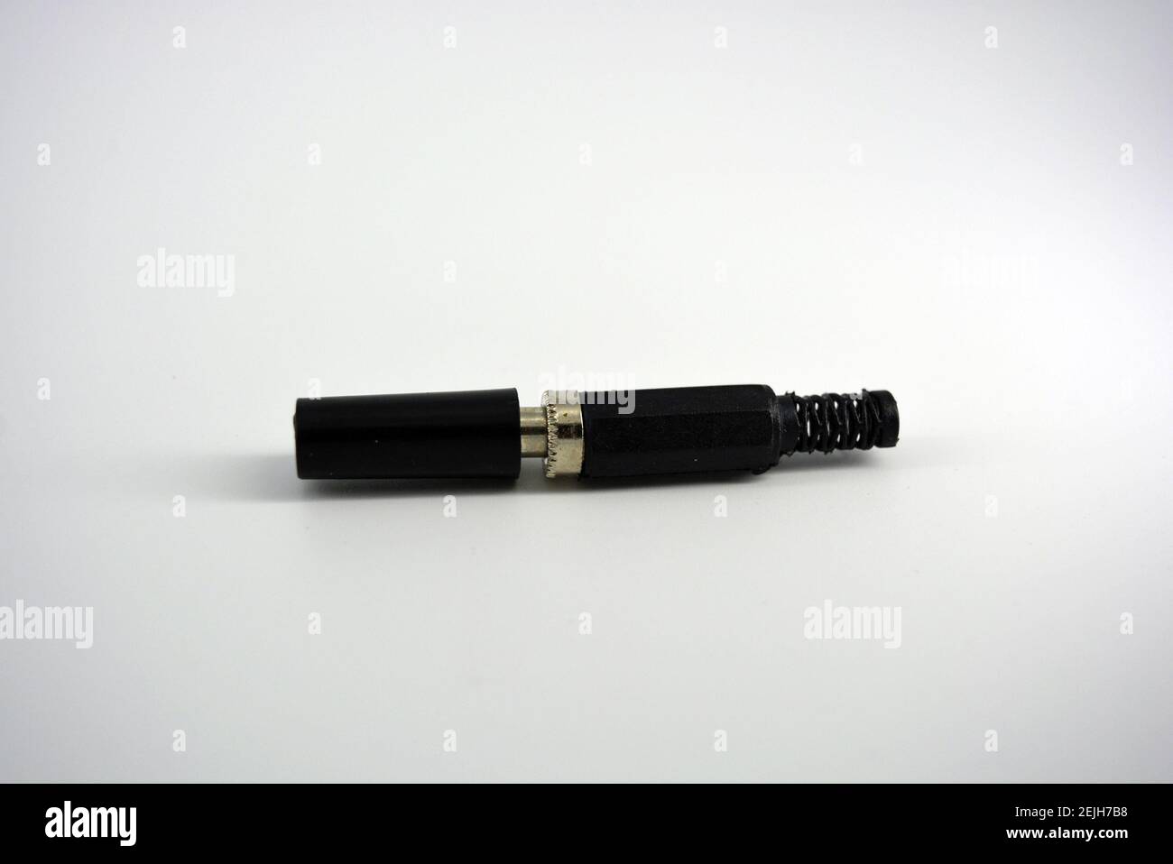 Metal dad connector and mom in black plastic protection located on a ...