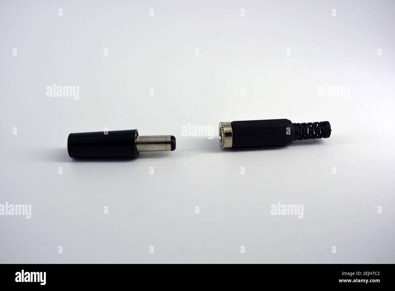 Metal dad connector and mom in black plastic protection located on a ...