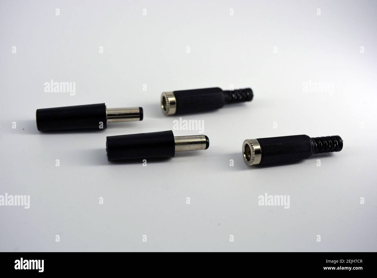 Metal dad connector and mom in black plastic protection located on a ...