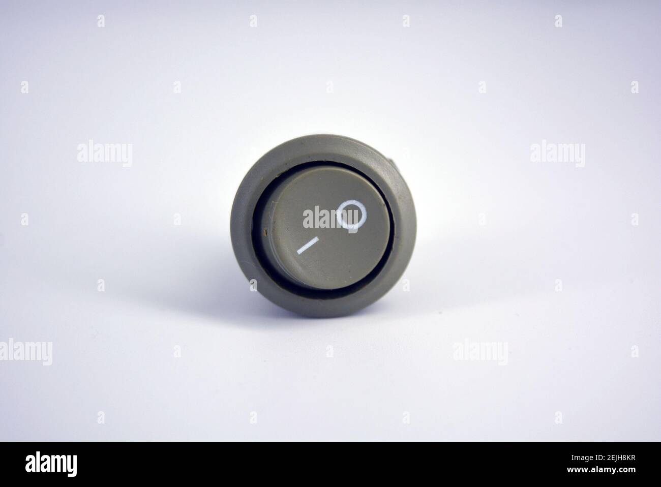 Gray metal button with contacts for switching and inclusion of 220V or ...