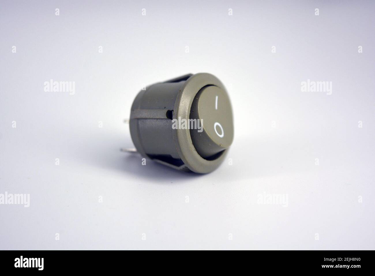 Gray metal button with contacts for switching and inclusion of 220V or ...