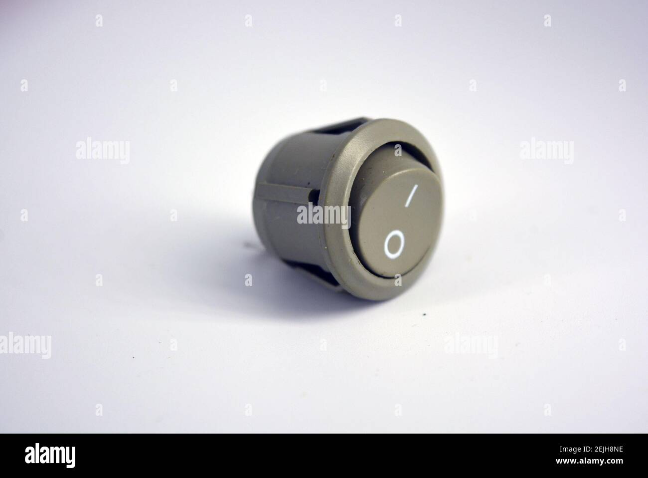 Gray metal button with contacts for switching and inclusion of 220V or ...