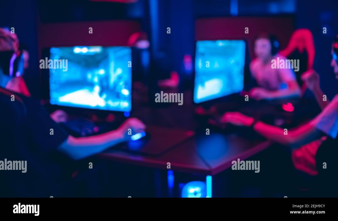 Blurred background professional team group gamer playing tournaments ...