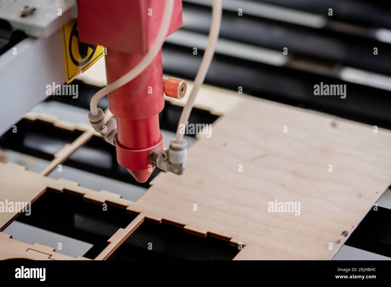 Laser CNC cutting wood. Modern machine industrial technology Stock ...