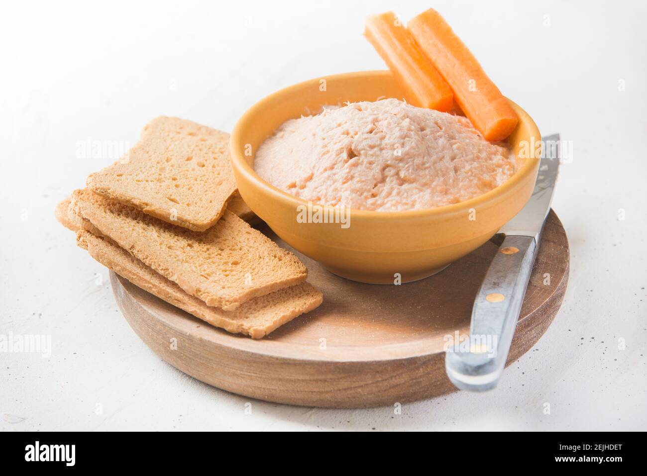 salmon pate with red caviar served, sliced bread and parrot Stock Photo ...