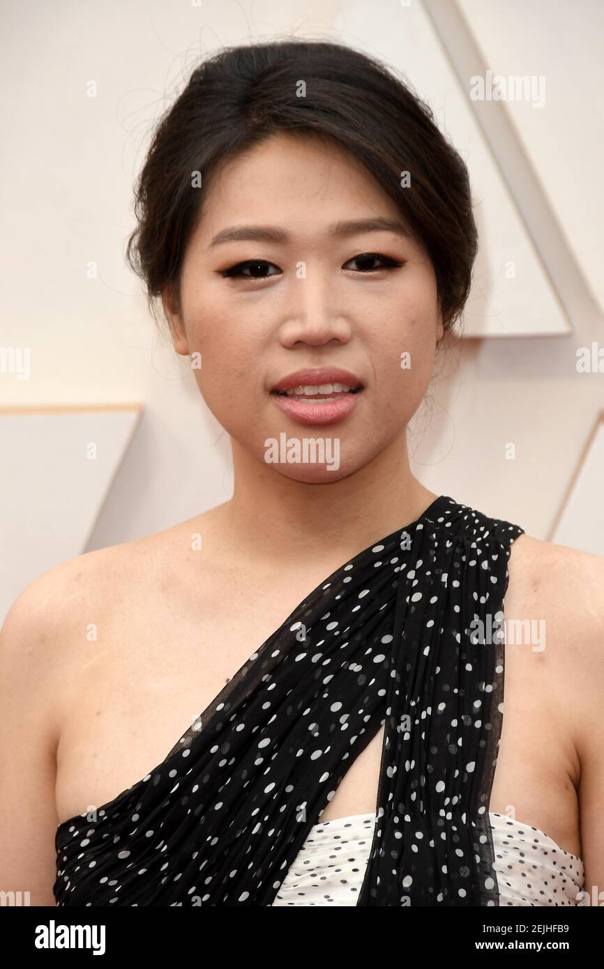 Siqi Song walking on the red carpet at the 92nd Annual Academy Awards ...