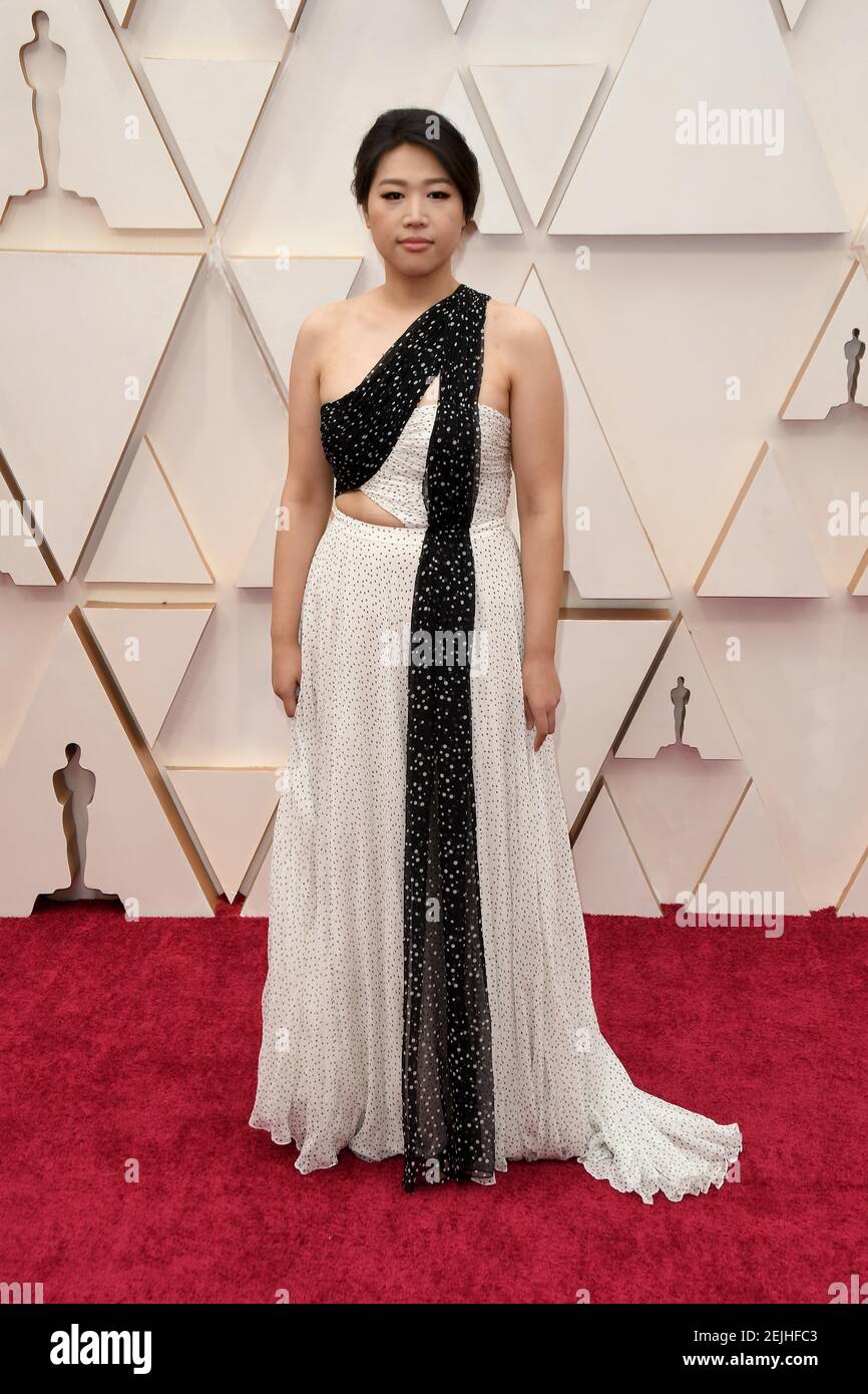 Siqi Song walking on the red carpet at the 92nd Annual Academy Awards ...