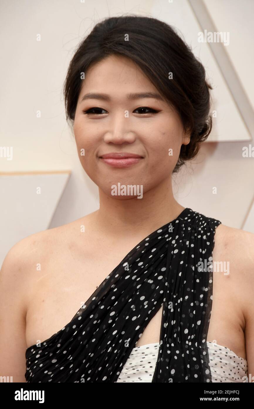 Siqi Song walking on the red carpet at the 92nd Annual Academy Awards ...