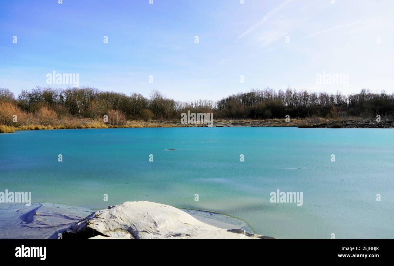 Blue Lagoon in Beckum, North Rhine Westphalia. Frozen turquoise blue ...