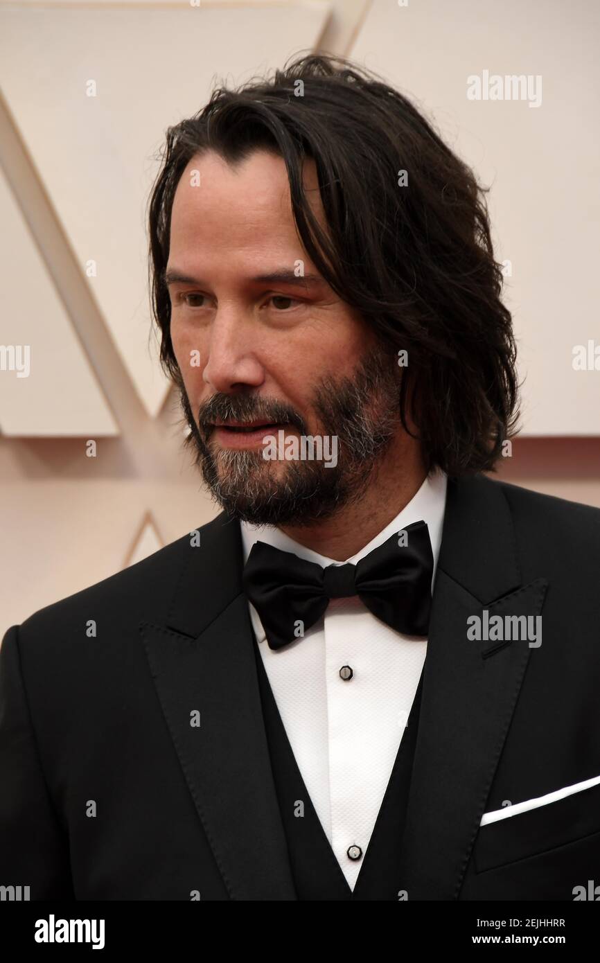 Keanu Reeves walking on the red carpet at the 92nd Annual Academy ...
