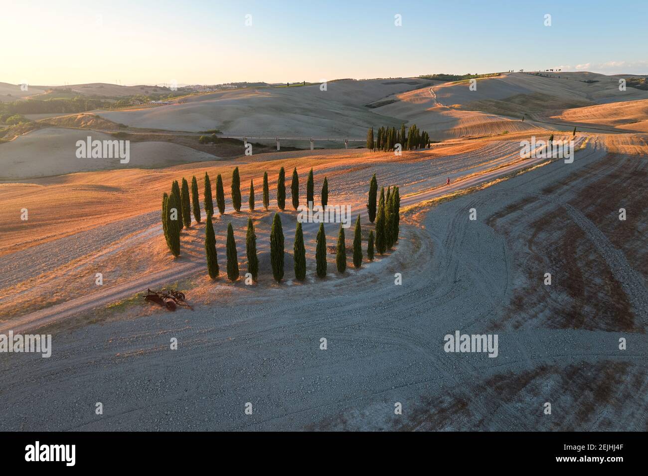 Aerial, vertical view of the famous circle of cypress trees. Colorful ...