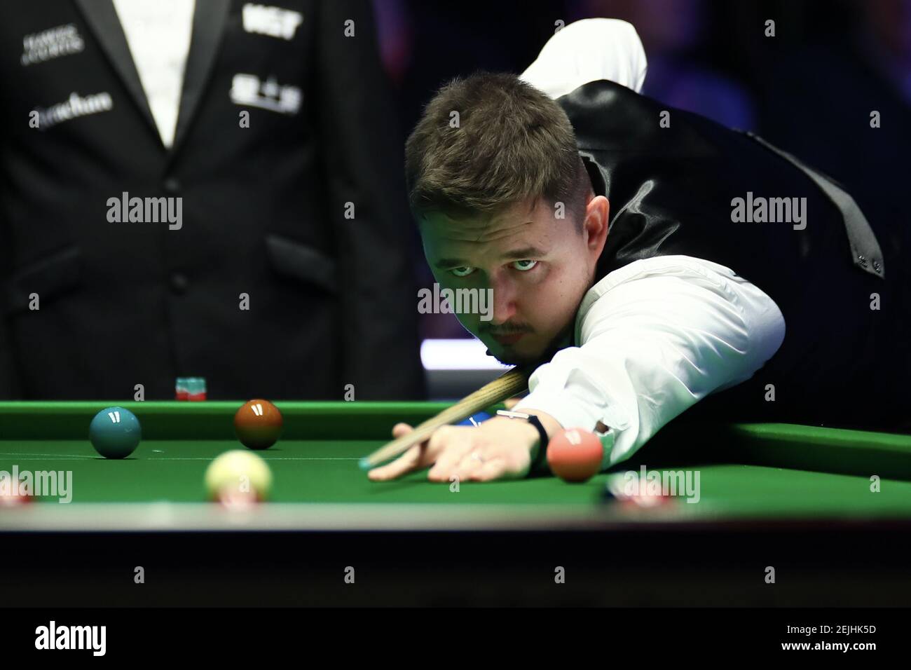 Kyren Wilson of England plays a shot to John Higgins of Scotland at the ...