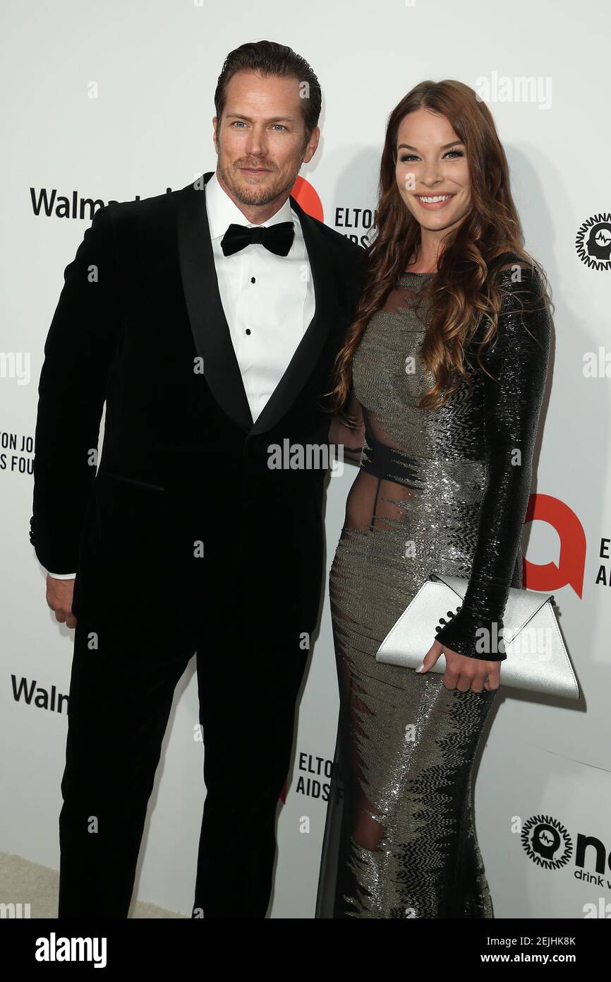 Jason Lewis, Liz Godwin attend the 28th Annual Elton John AIDS ...