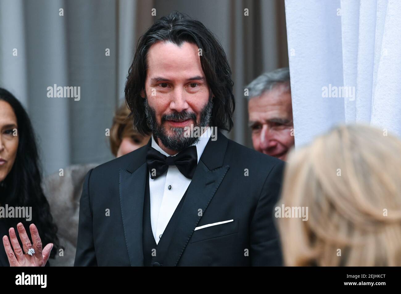 Keanu Reeves walking on the red carpet at the 92nd Annual Academy ...