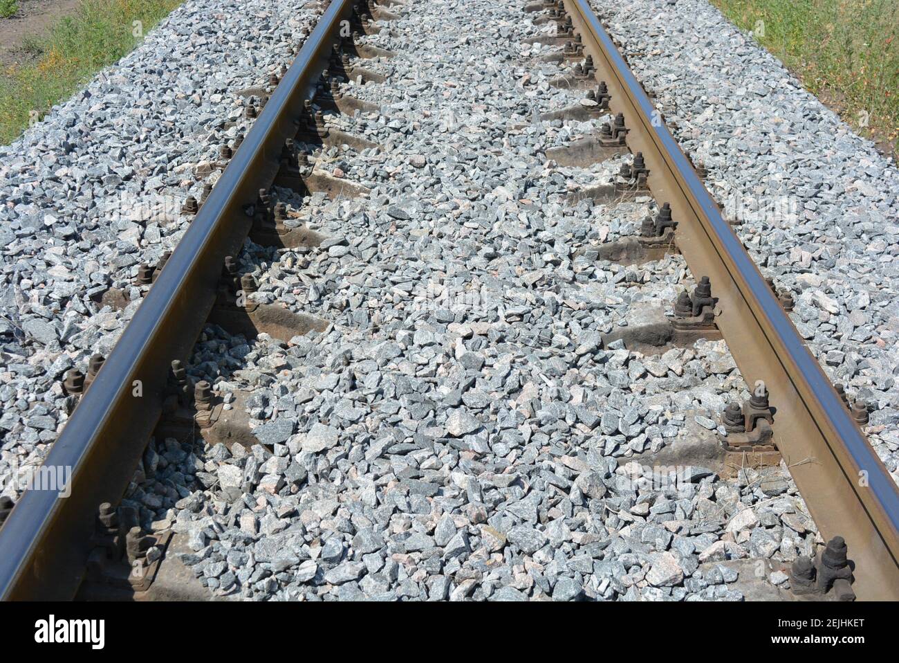 Repaired railroad tracks for freight trains with updated gray stone ...