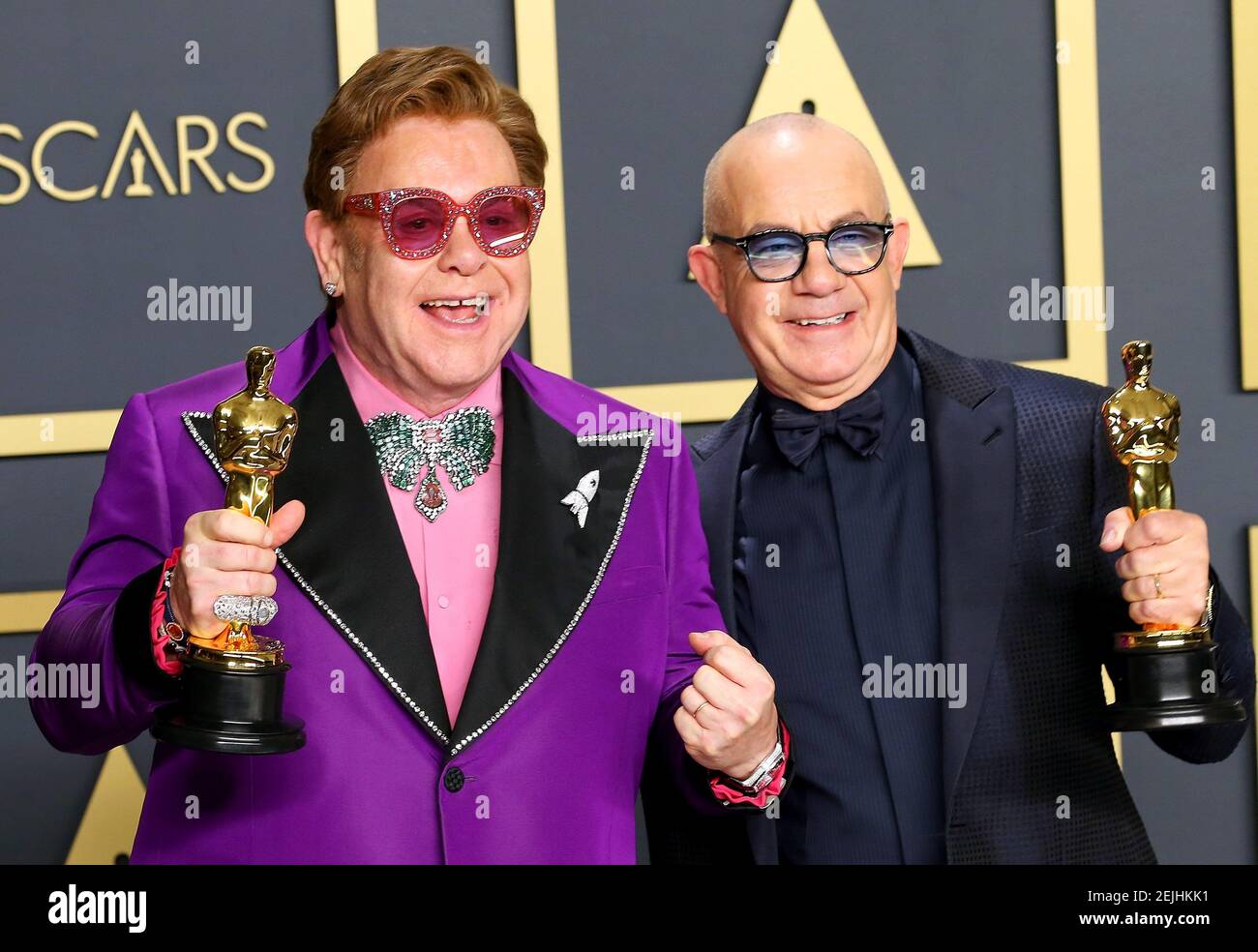 HOLLYWOOD, CA - FEBRUARY 9: Bernie Taupin, Elton John pose in the press ...
