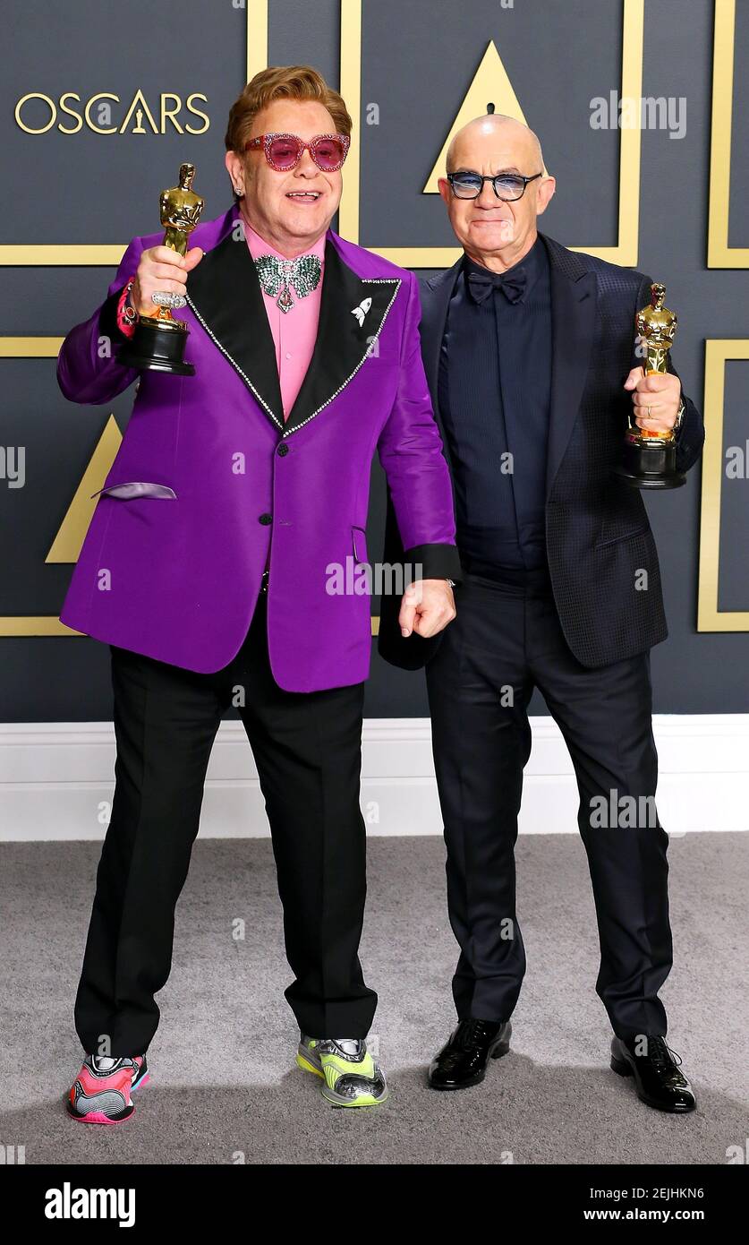 HOLLYWOOD, CA - FEBRUARY 9: Bernie Taupin, Elton John pose in the press ...