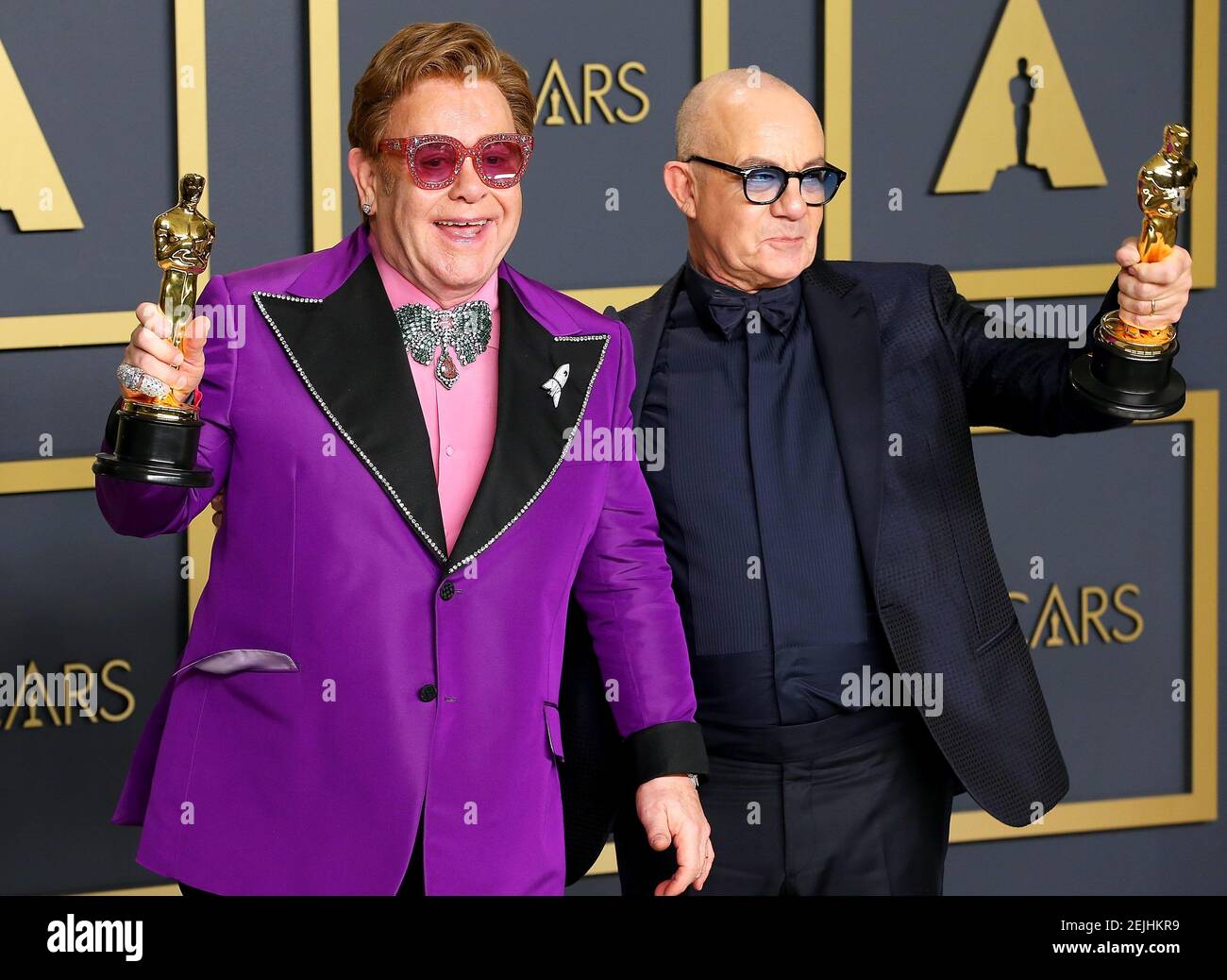 HOLLYWOOD, CA - FEBRUARY 9: Bernie Taupin, Elton John pose in the press ...