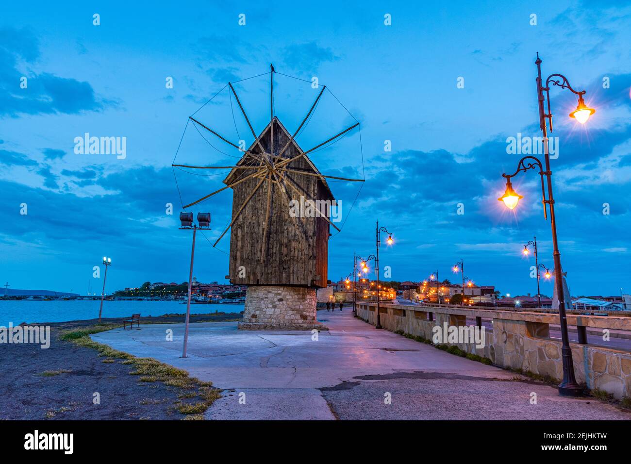Wooden windmill at the entrance to the old town of Nessebar Stock Photo ...