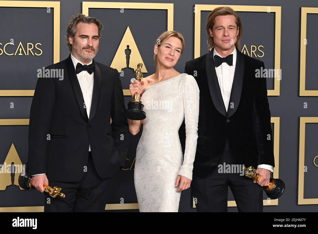 (L-R) Joaquin Phoenix, winner of the Actor in a Leading Role award for ...
