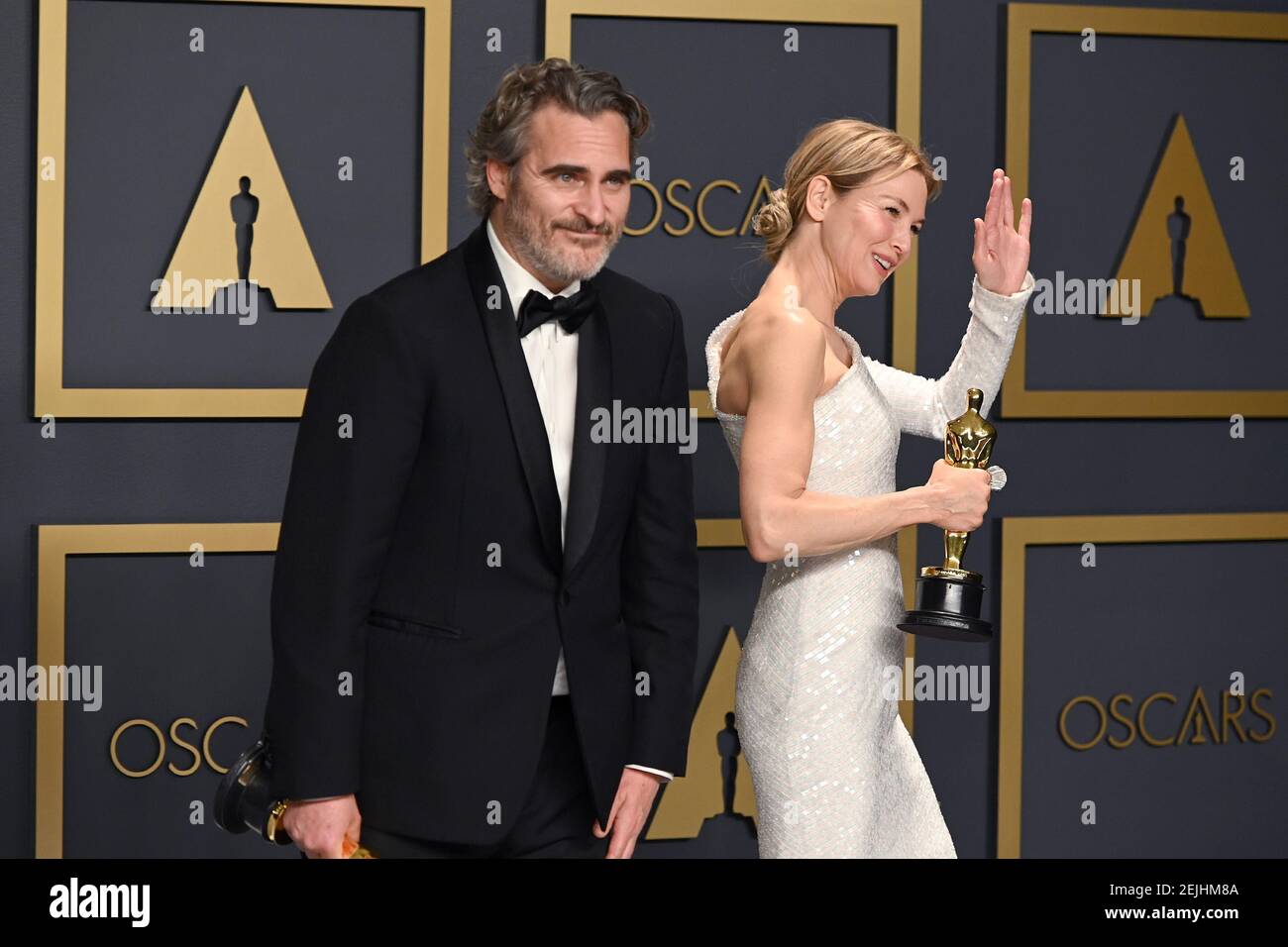 (L-R) Joaquin Phoenix, winner of the Actor in a Leading Role award for ...