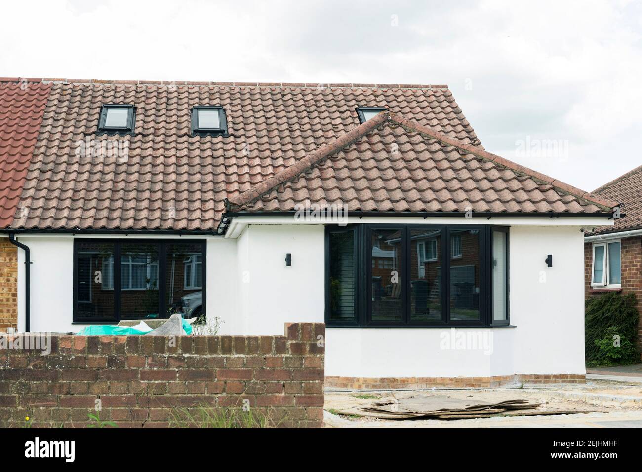 A modern typical house which has been renovated with white render and ...