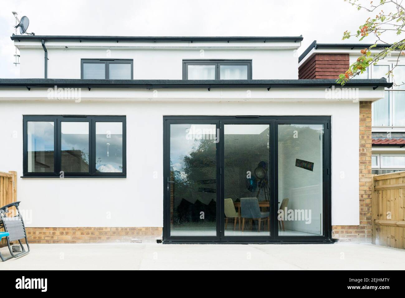 A modern typical house which has been renovated with white render and ...