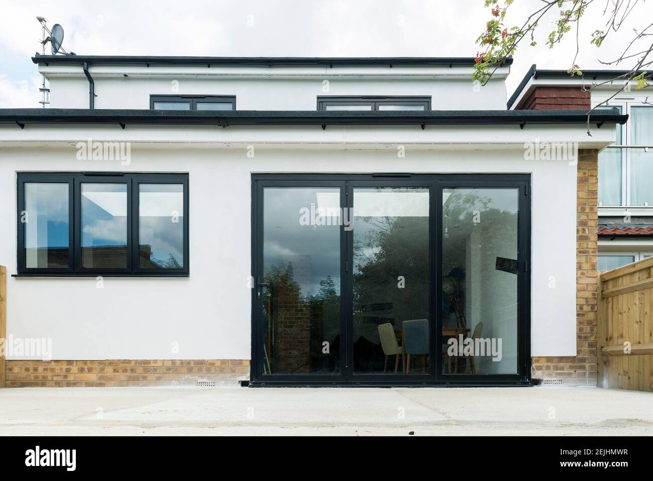 A modern typical house which has been renovated with white render and ...