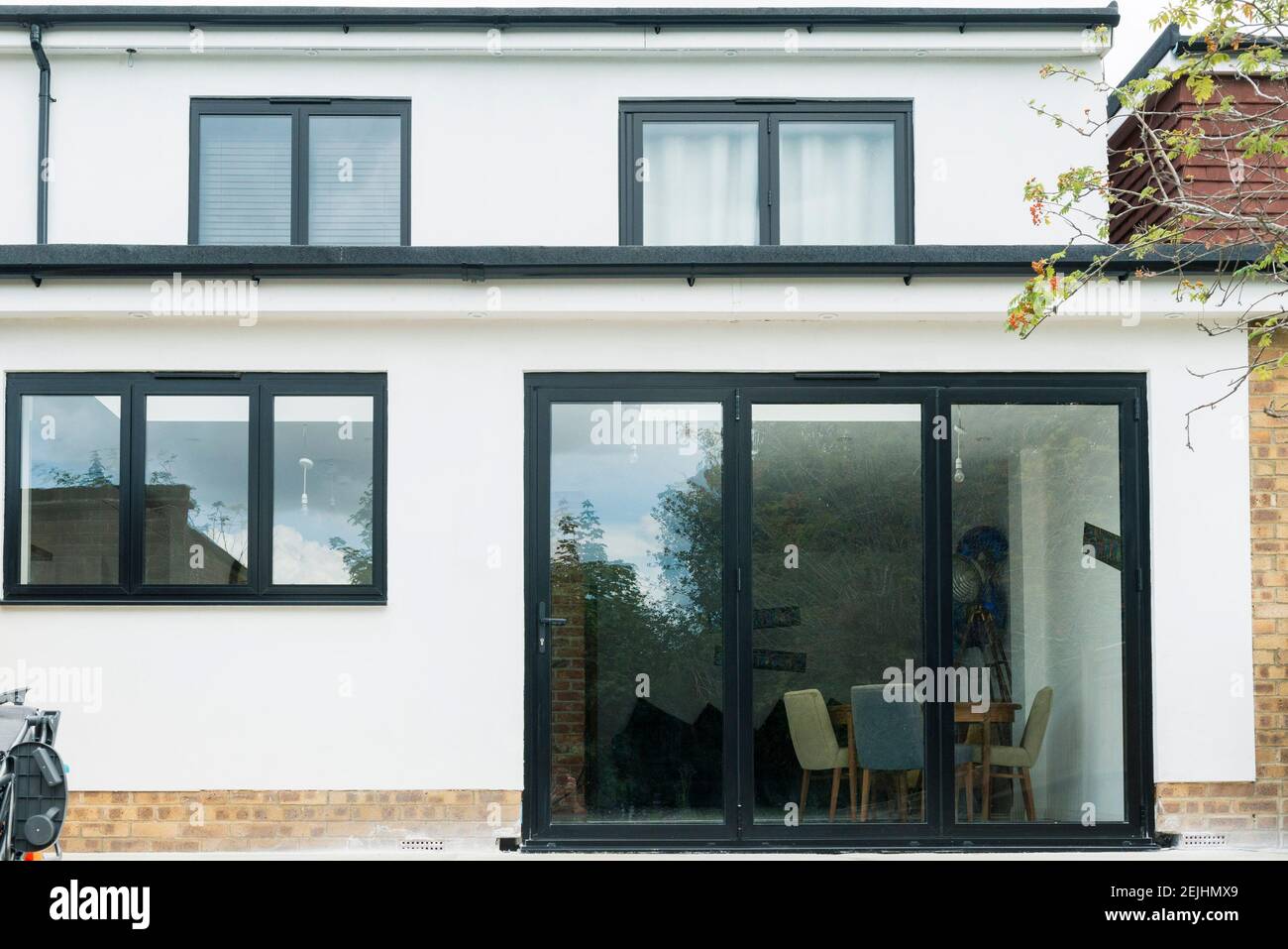 A modern typical house which has been renovated with white render and ...
