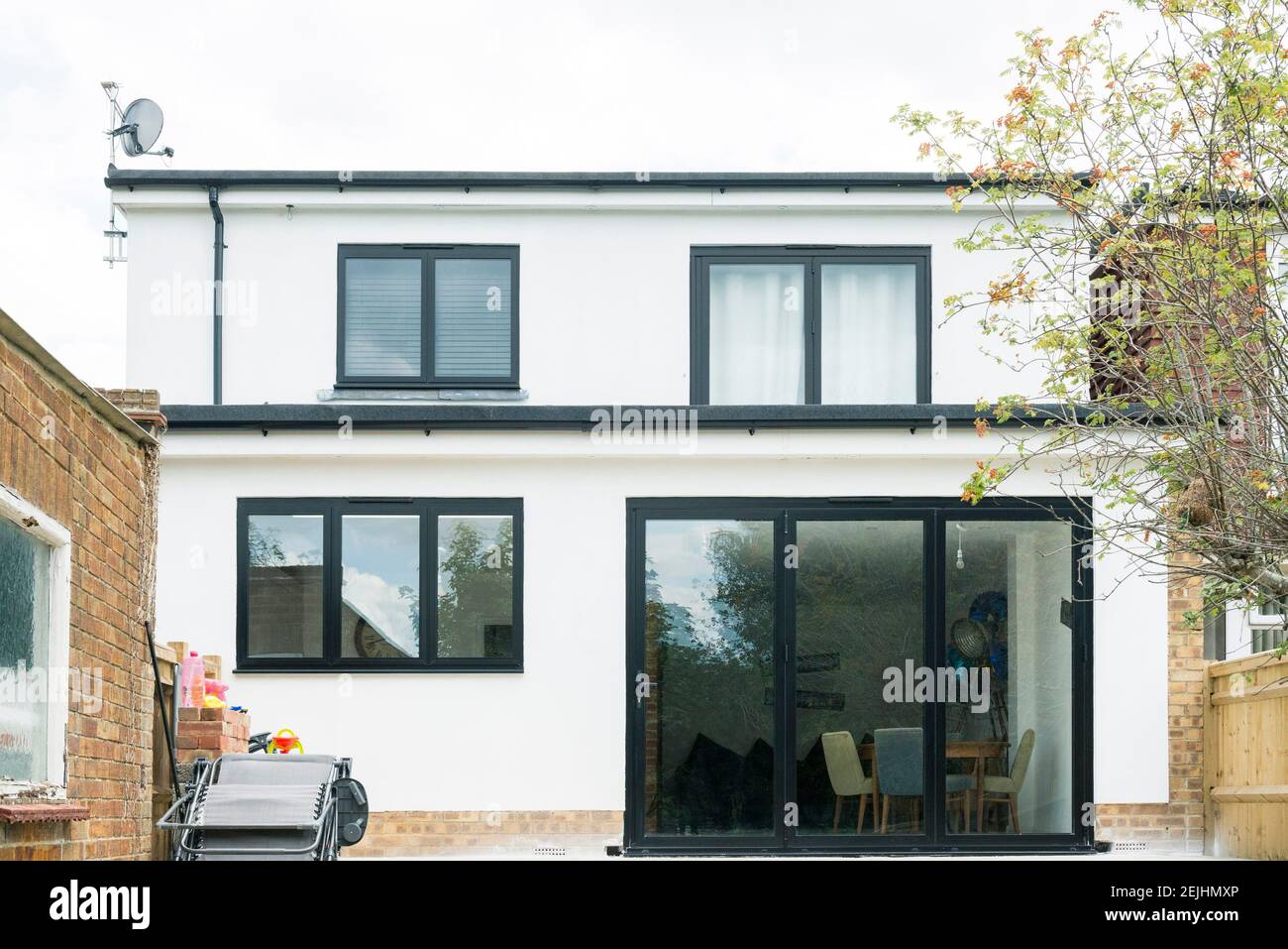 A modern typical house which has been renovated with white render and ...