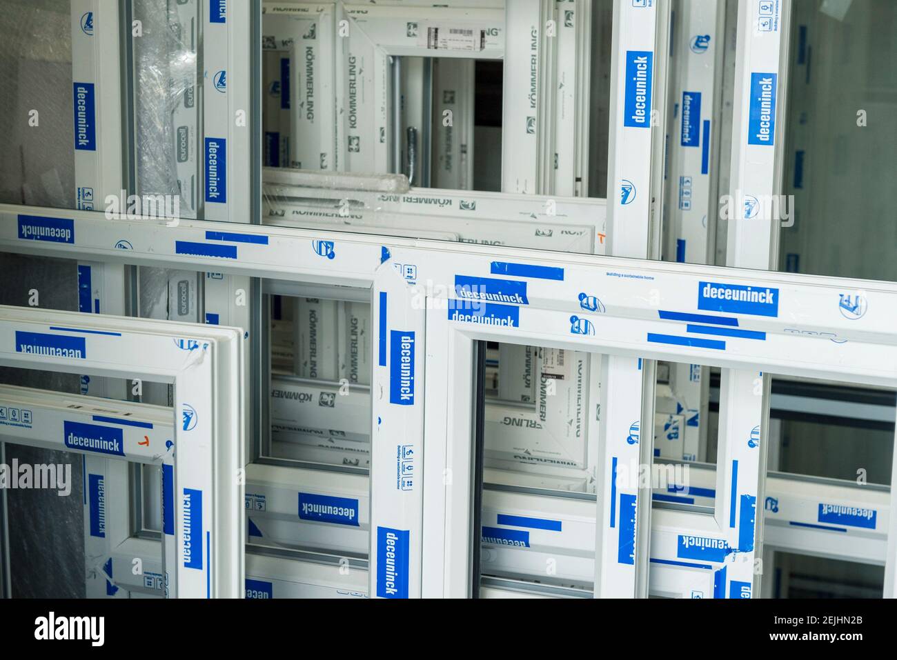 A double glazing business store room, show room with lots of plastic ...