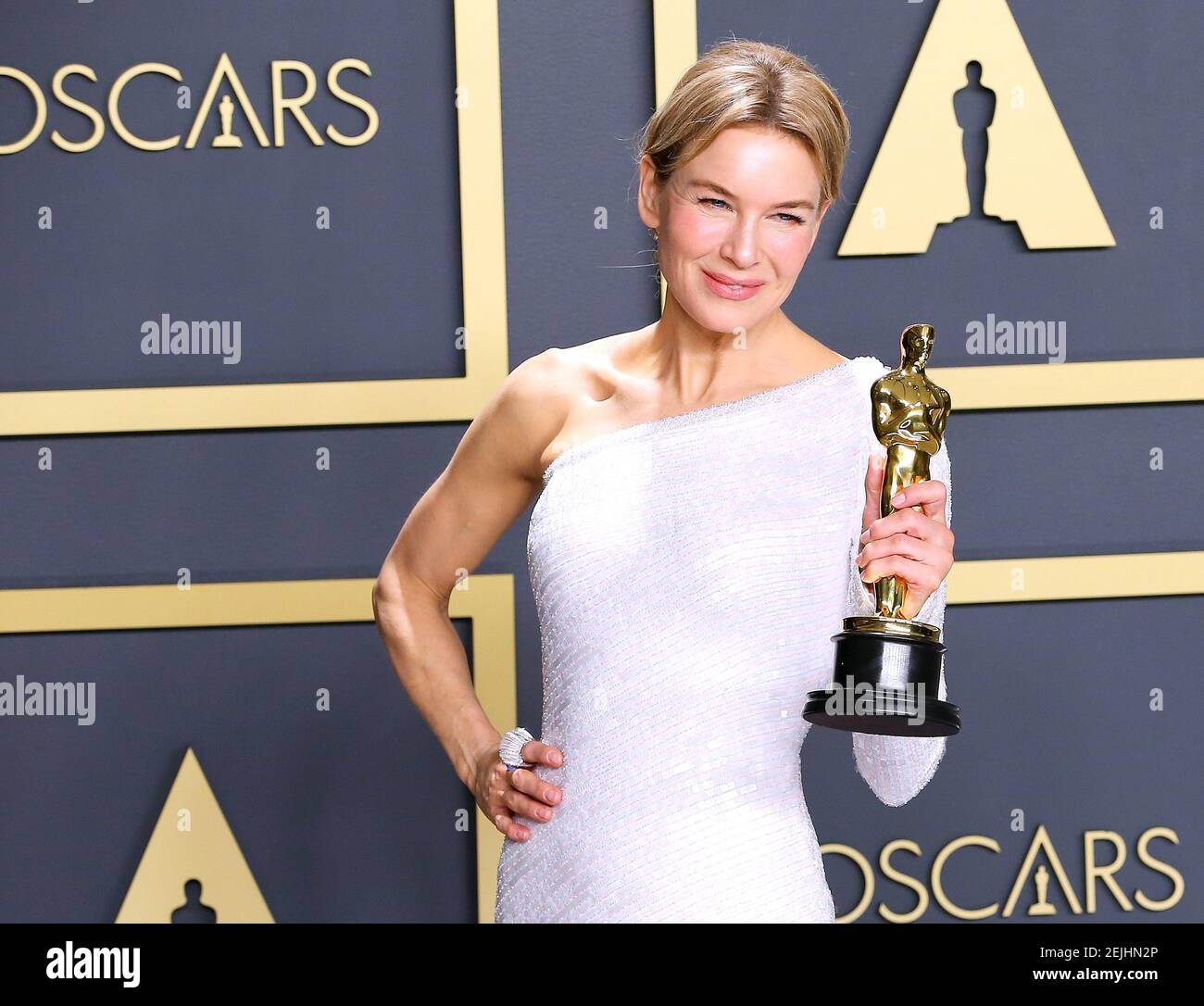 HOLLYWOOD, CA - FEBRUARY 9: Renee Zellweger poses in the press room ...
