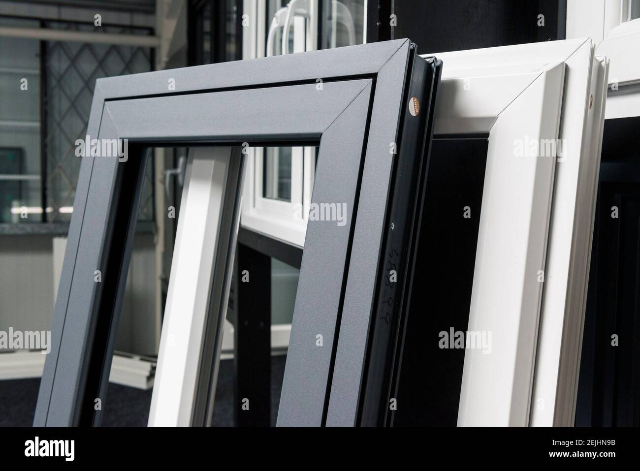 A double glazing business store room, show room with lots of plastic ...