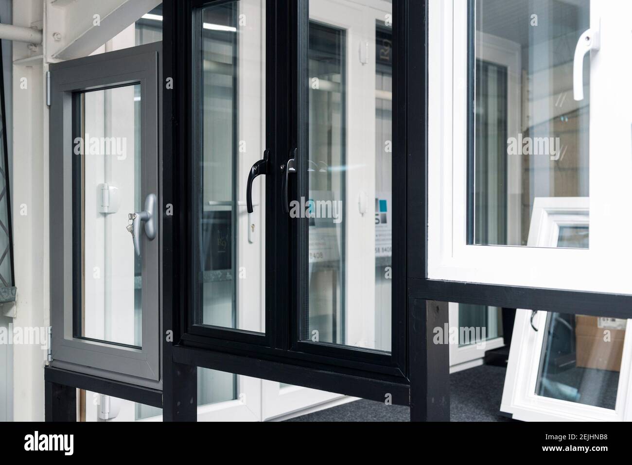 A double glazing business store room, show room with lots of plastic ...