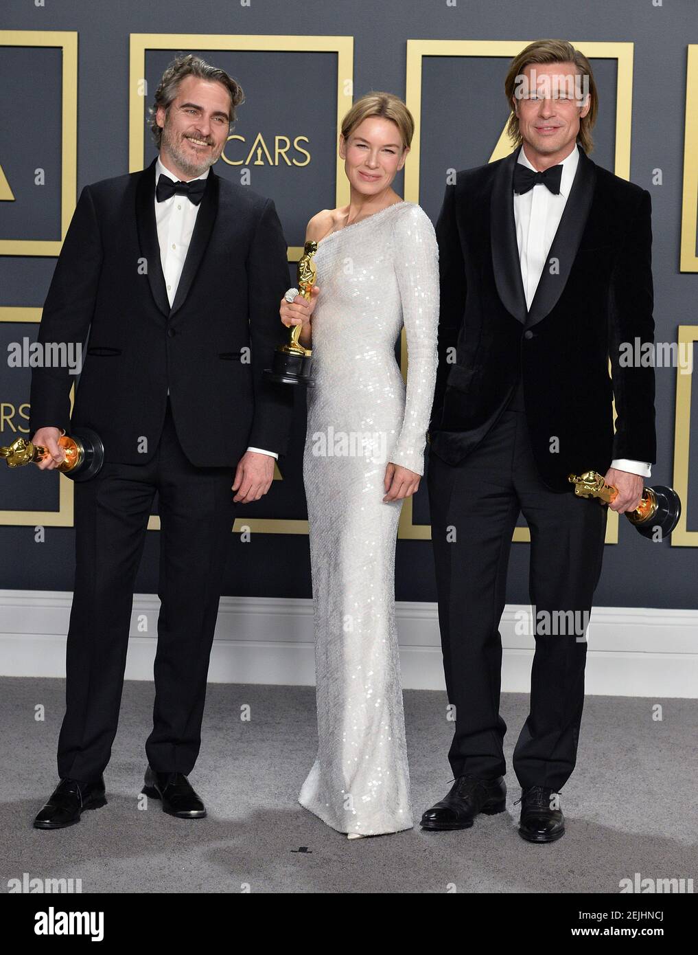(L-R) Joaquin Phoenix, winner of the Actor in a Leading Role award for ...