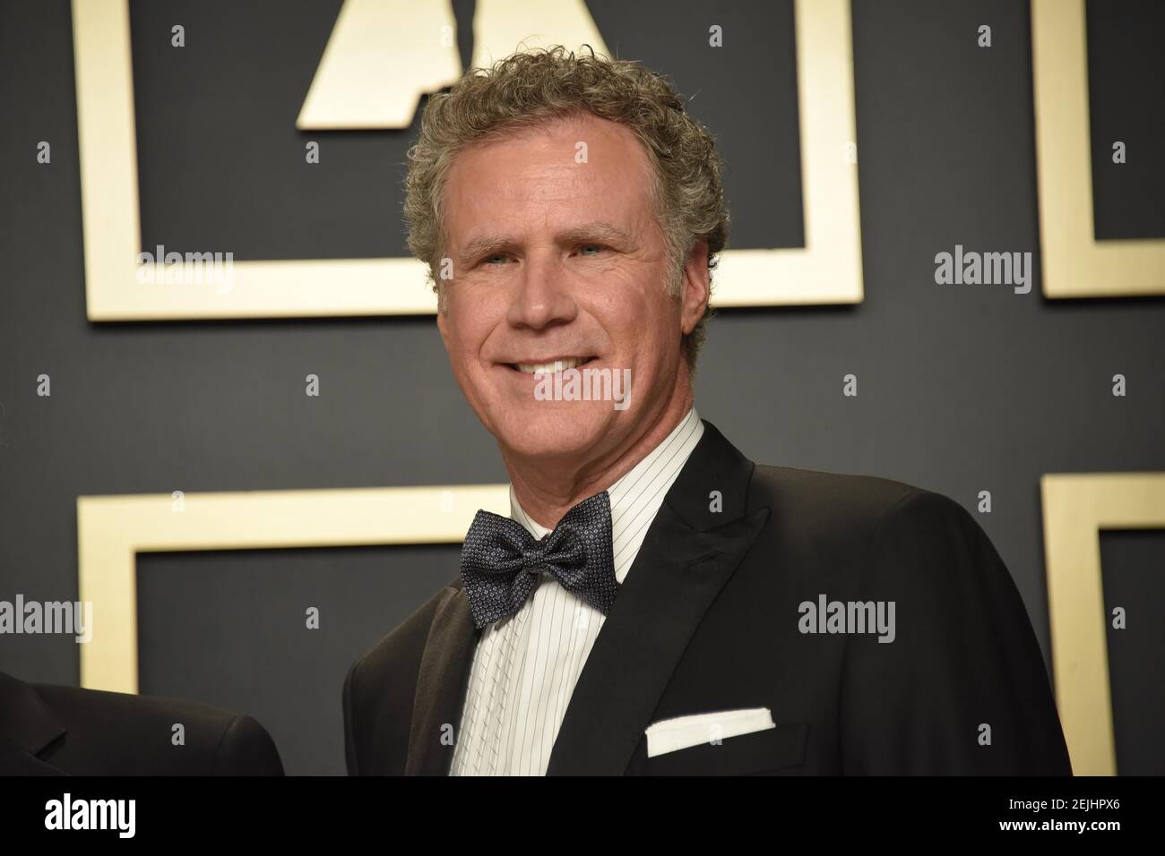 Will Ferrell posing in the press room at the 92nd Annual Academy Awards ...