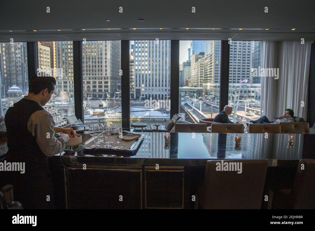 Windows overlook the Chicago River at The Langham's upscale Travelle ...