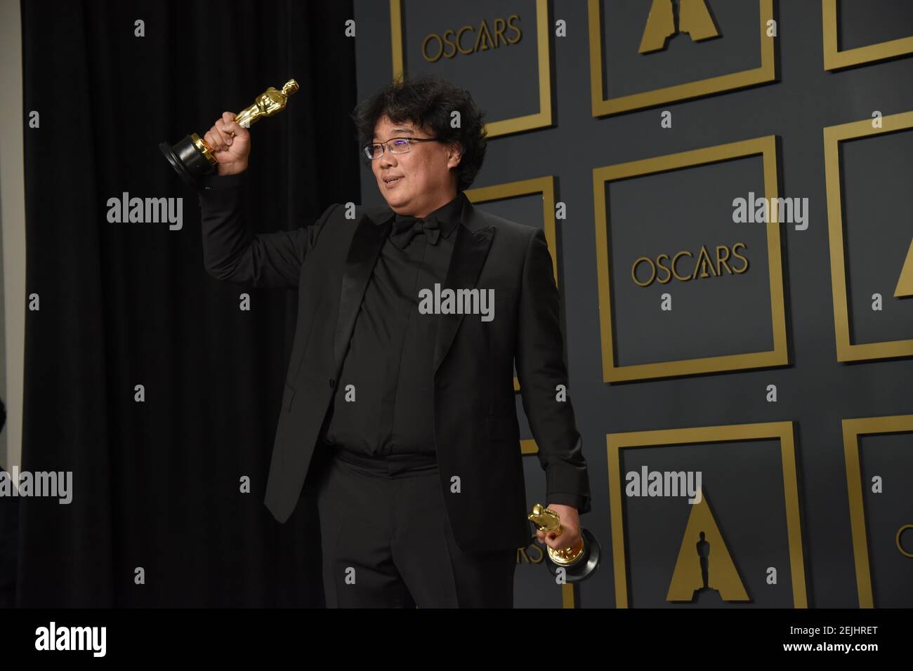 "Parasite" director Bong Joon-ho posing in the press room at the 92nd ...