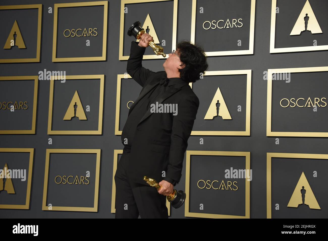 "Parasite" director Bong Joon-ho posing in the press room at the 92nd ...