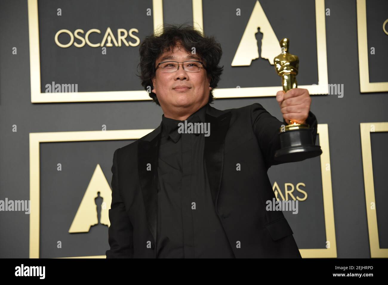 "Parasite" director Bong Joon-ho posing in the press room at the 92nd ...