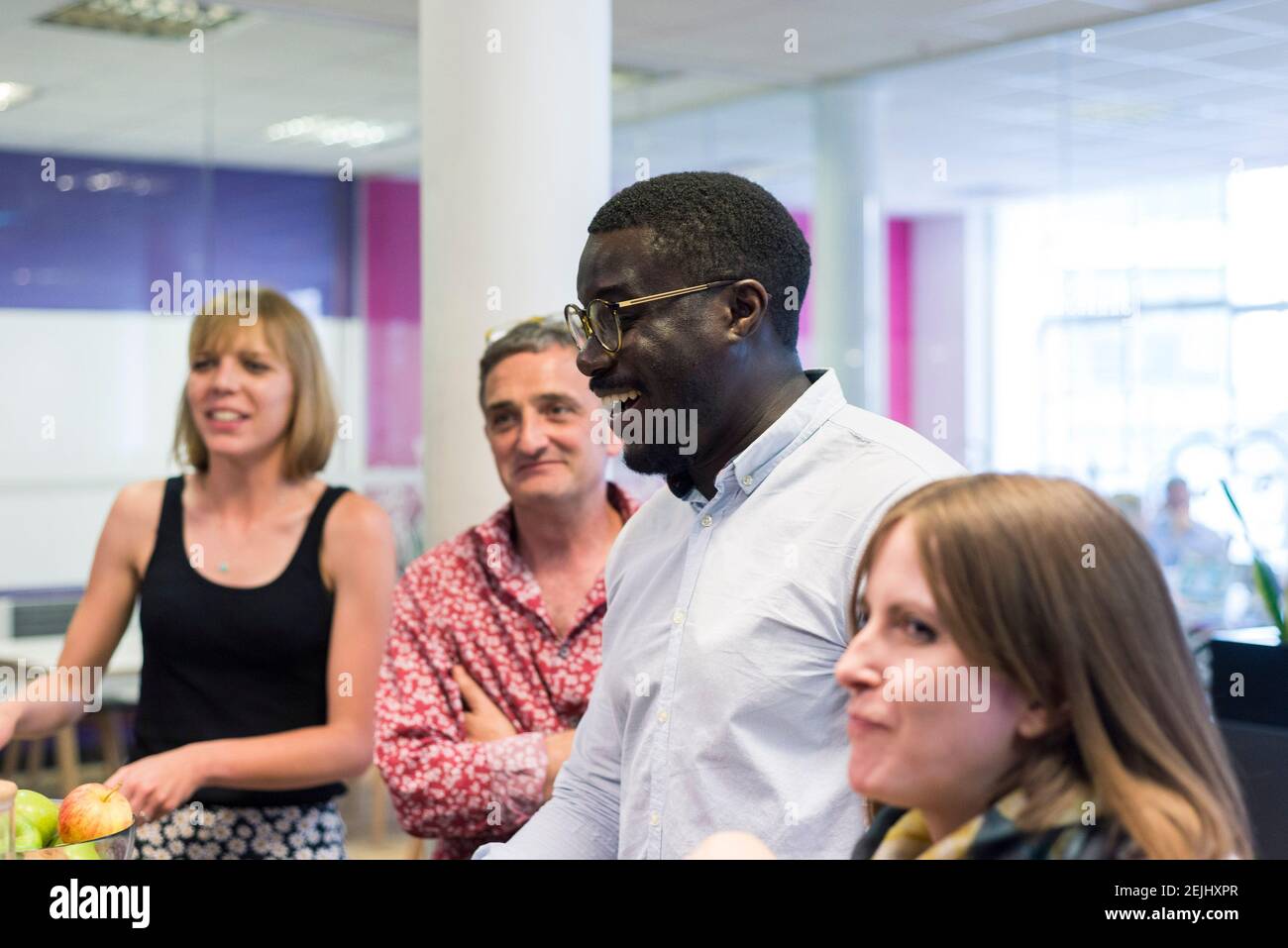 People sat at the work desk in an office and working Stock Photo - Alamy