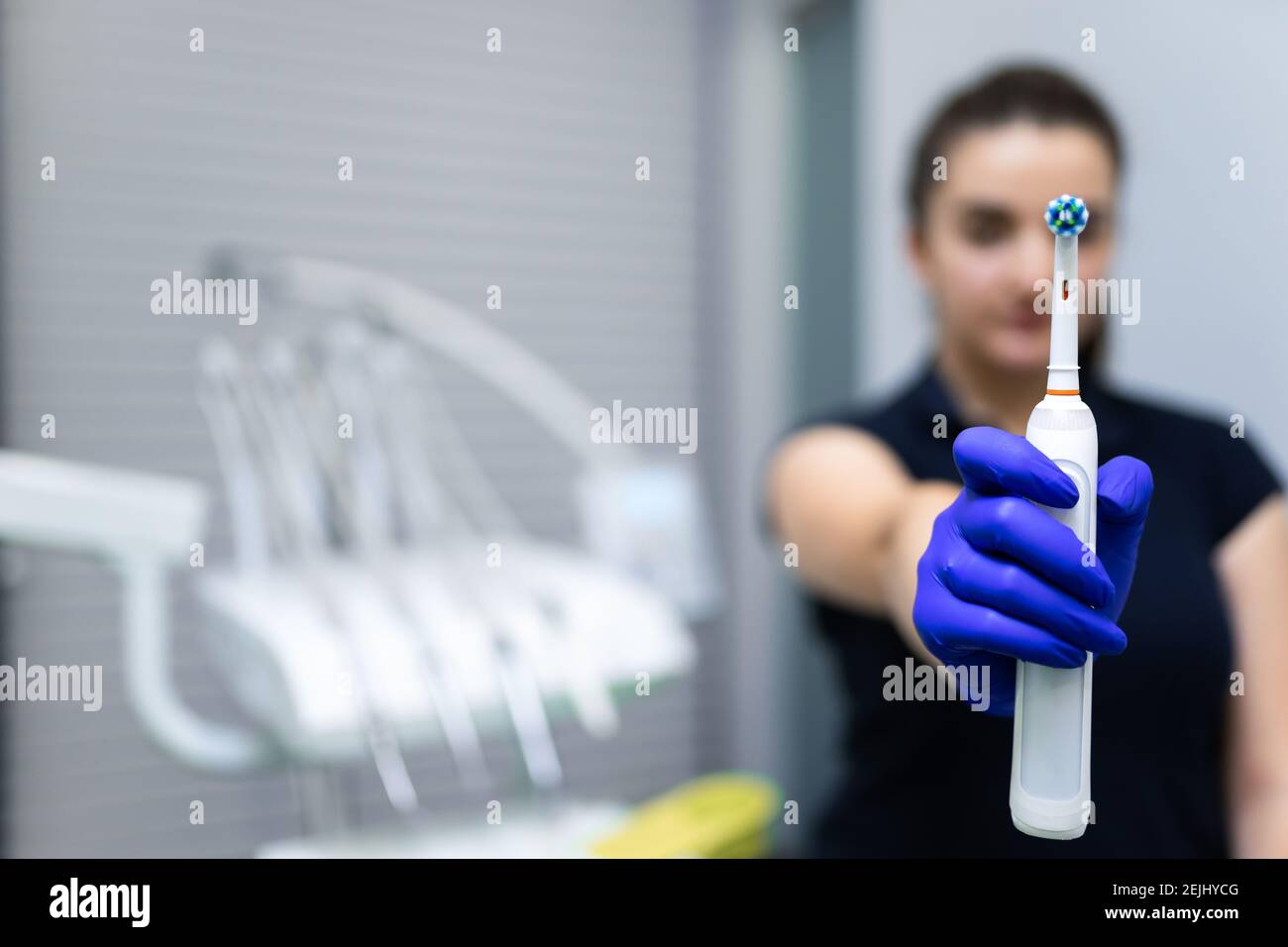 Female electric toothbrush hi-res stock photography and images - Alamy