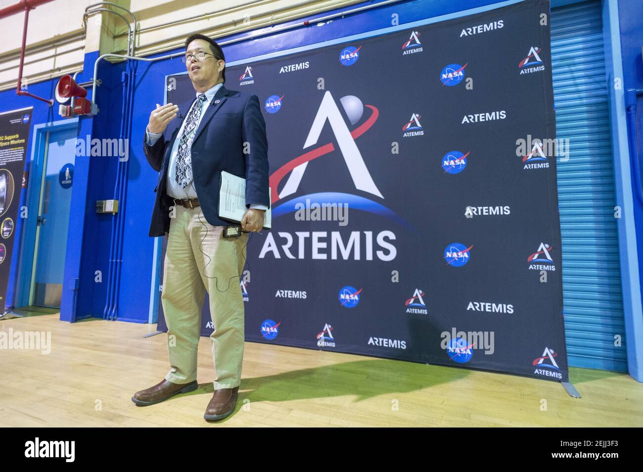Eugene Tu, center director of NASA Ames, speaks to media inside the ...