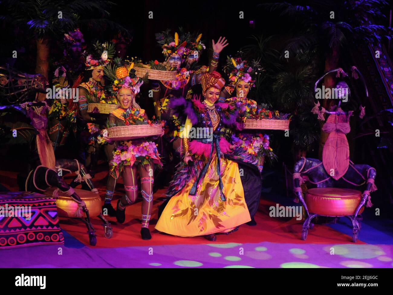 Artists dressed in traditional costumes perform during the grand ...