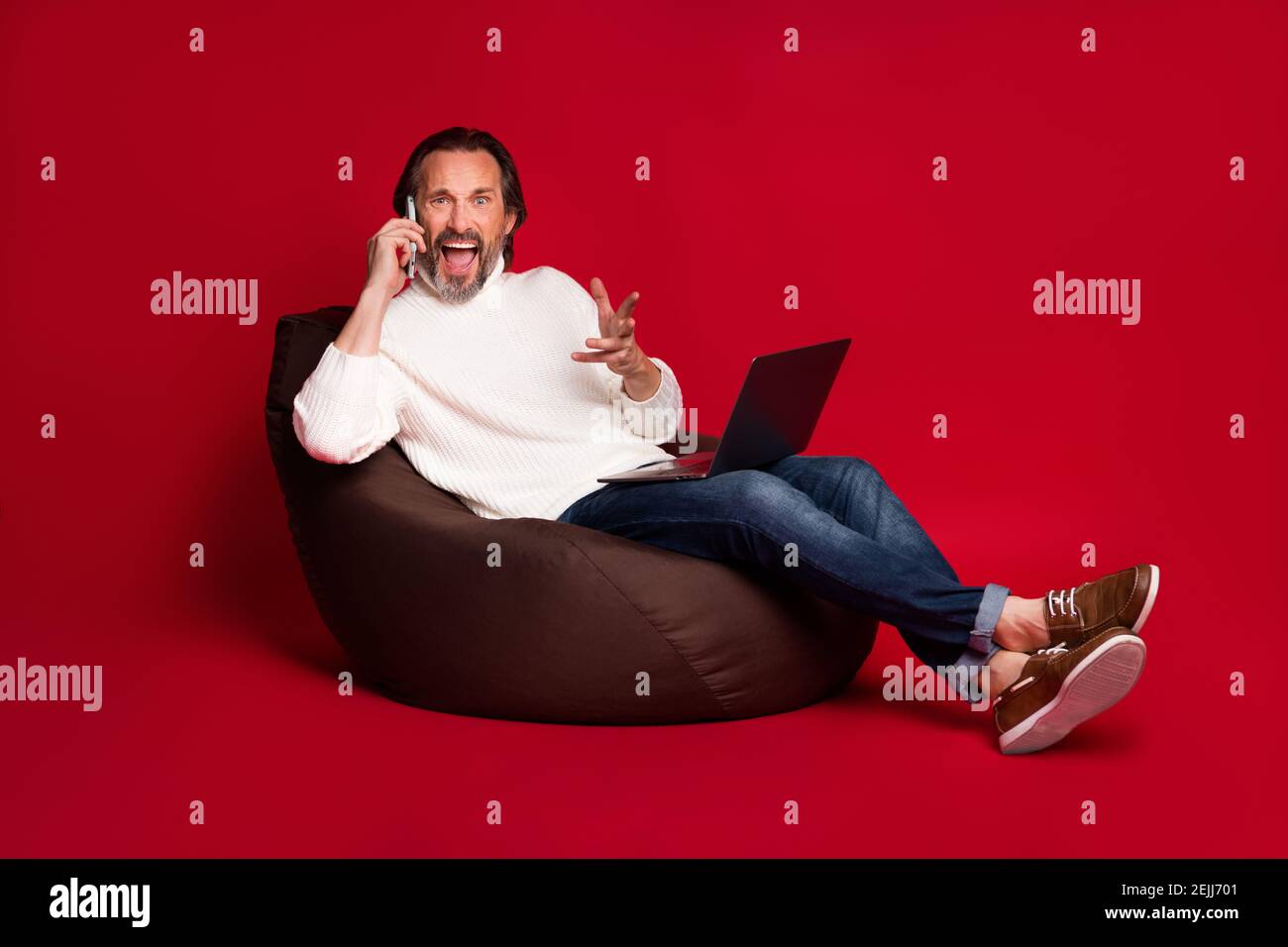 Full length profile photo of furious guy speak phone open mouth scream ...