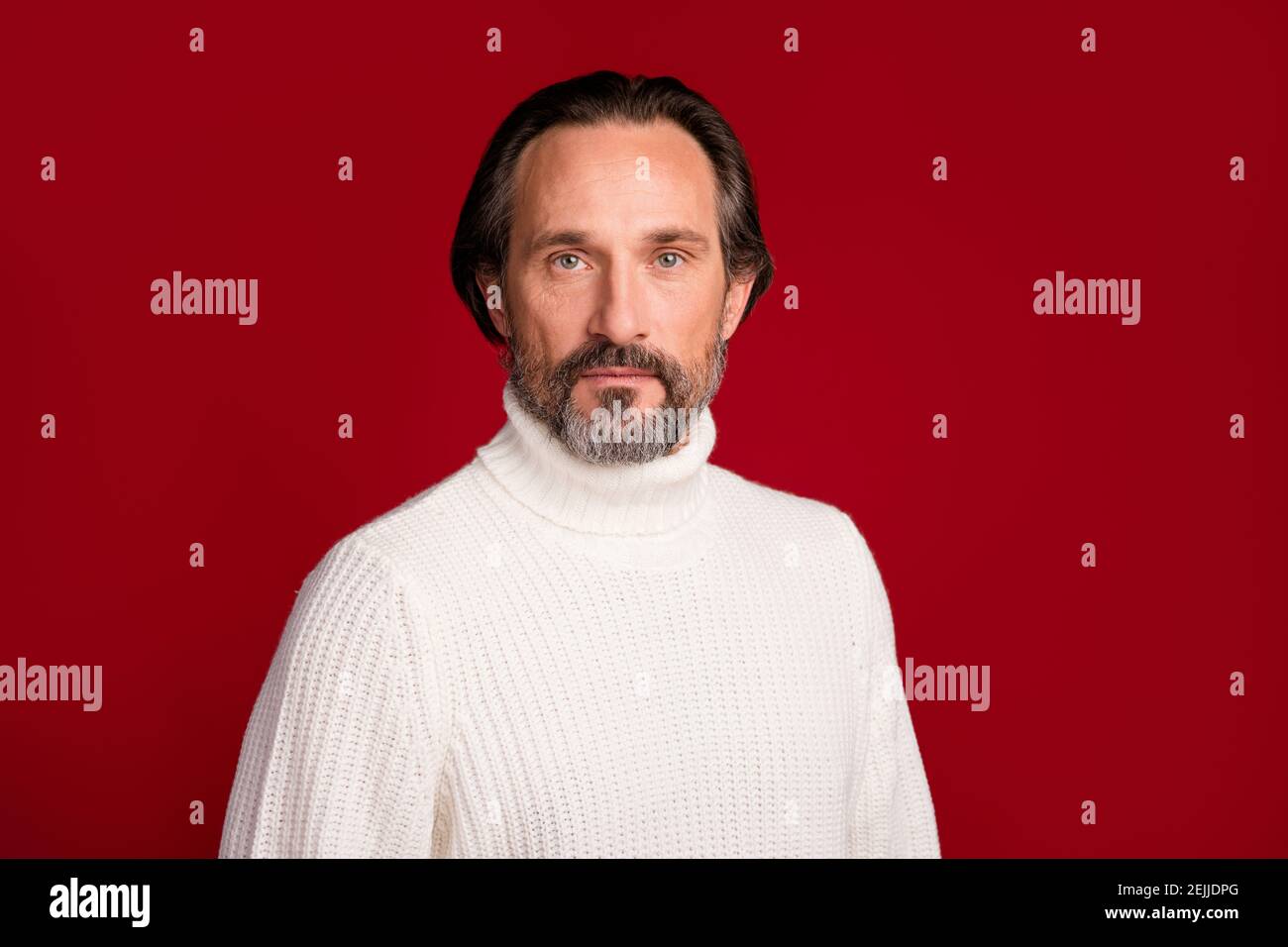 Portrait of half turned person looking camera wear warm clothing ...